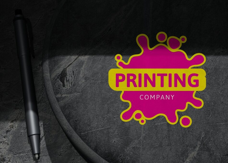Printing Logo Design on Dark Desk Background | Mediamodifier