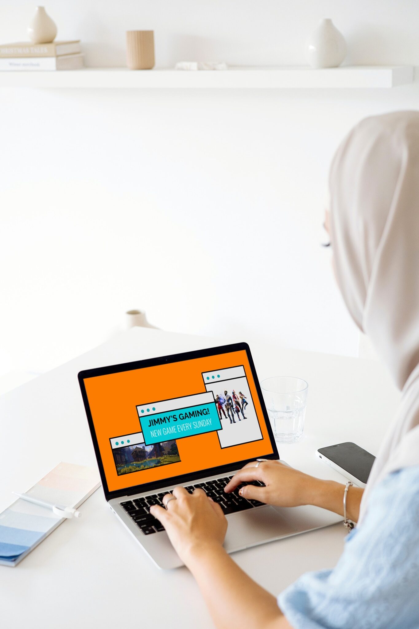 Photoshop Mockup of Woman Typing on MacBook in Desk | Mediamodifier