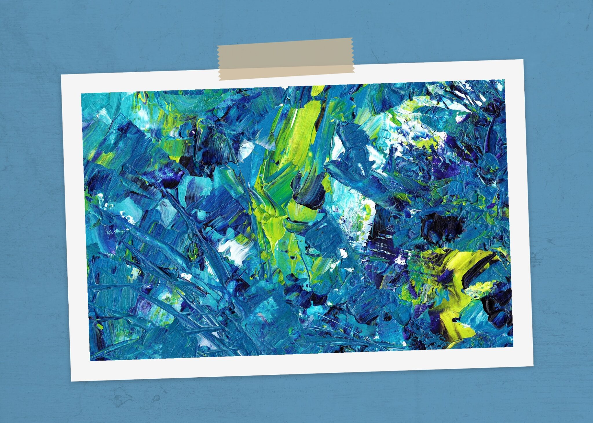 Photoshop Mockup of Photo Taped to a Wall | Mediamodifier
