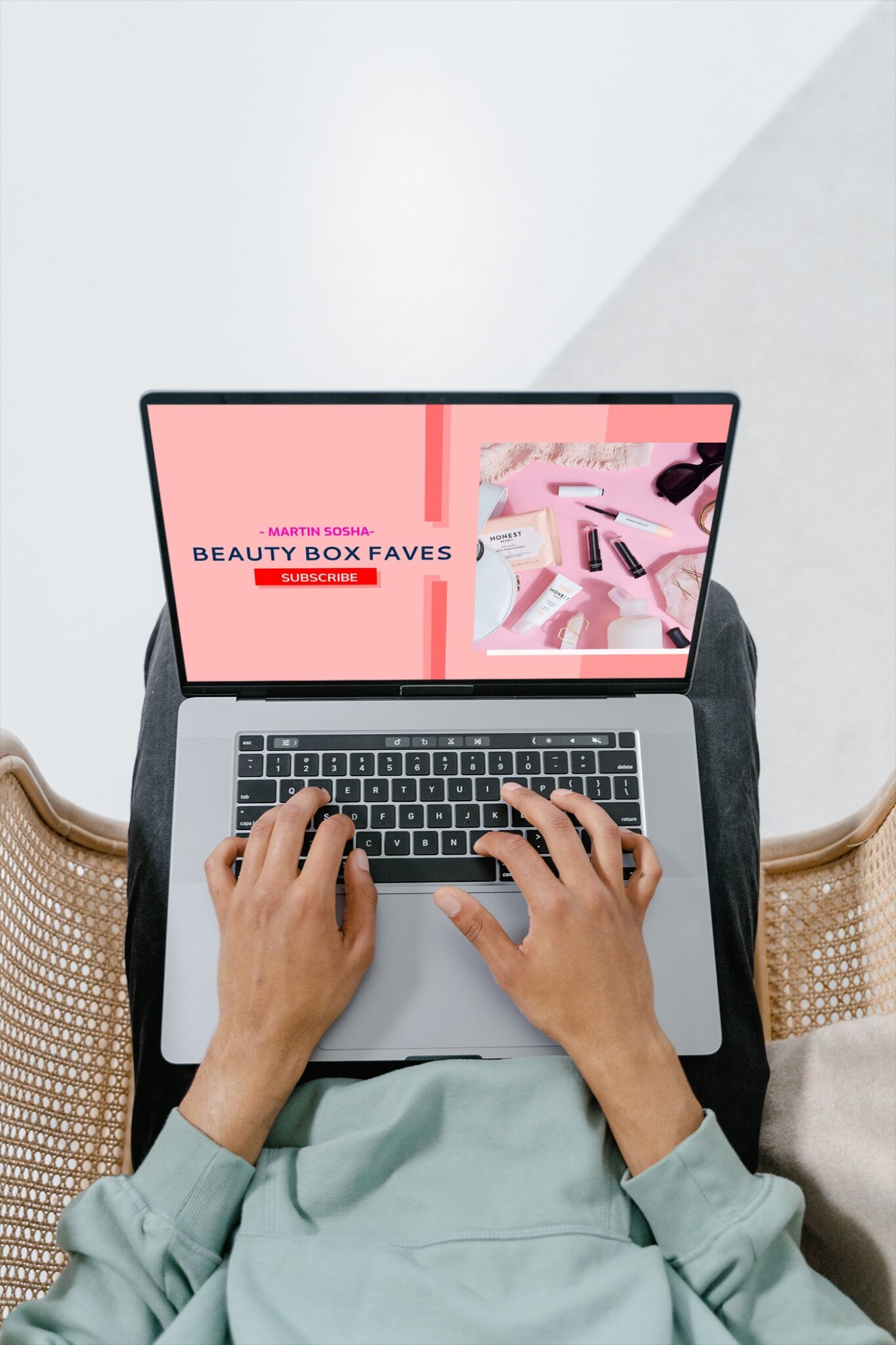 PSD Mockup Template of a Man Typing on MacBook | Mediamodifier